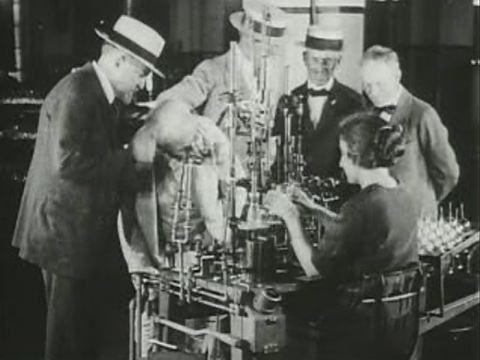 Thomas Edison in his light bulb factory, 1922. - Wazee Digital